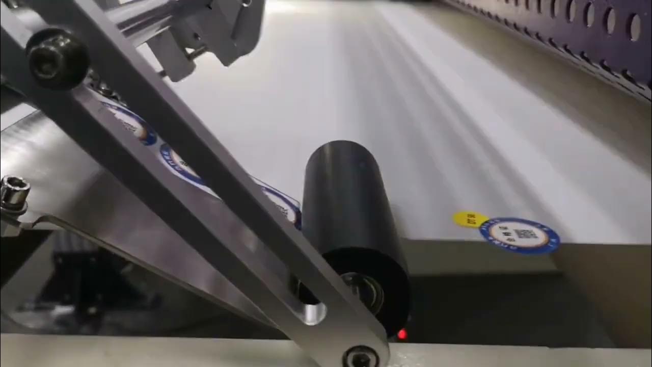 Automatic data collection labeling machine for film rolls - YouTube