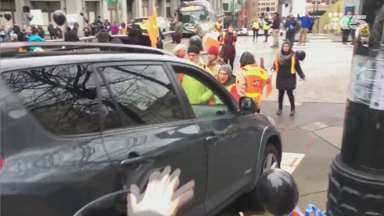 RAW: Angry driver barrels into Seattle protesters - YouTube