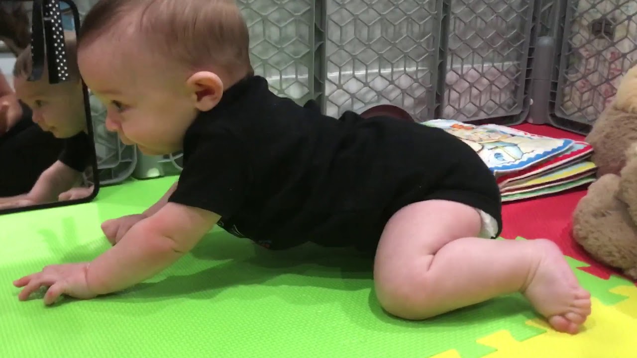 Solid plank 😅🥰 5 month old learning to scootch / crawl, ends up ...
