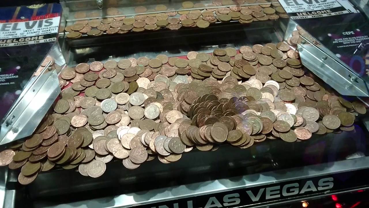 Playing The Elvis Coin Pusher In The Arcades - YouTube