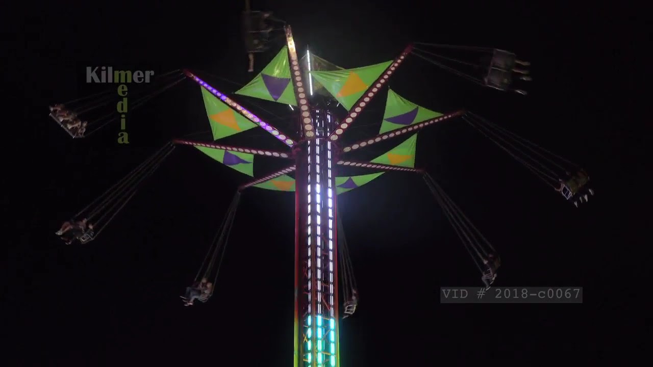 Vertigo Carnival Swing Ride During a Festival at Night - YouTube