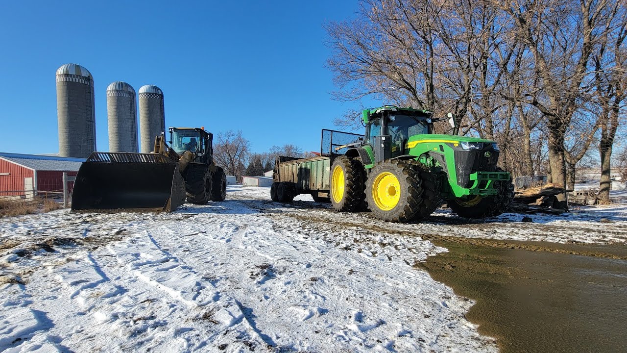 Another day, another load! Digging deep to clean out this manure lagoon ...