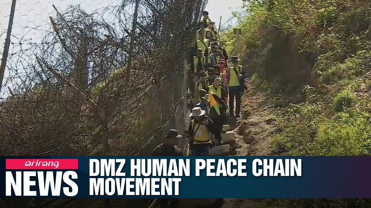 People at DMZ for Peace Human Chain Movement - YouTube