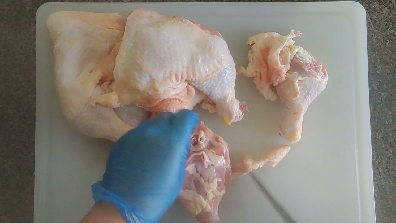 Separating Chicken Leg Quarters and Removing Excess Skin - YouTube