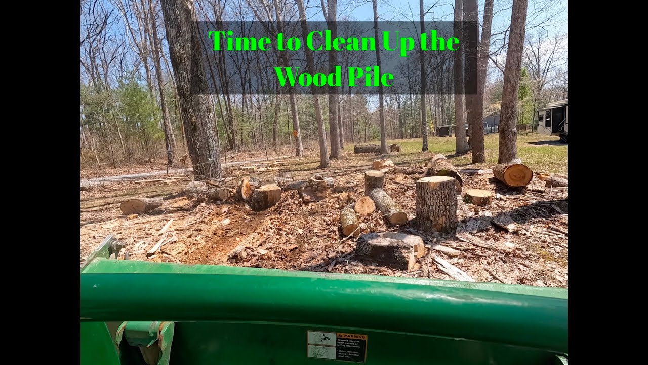 Time to Clean up the old wood pile with my John Deere tractor # ...