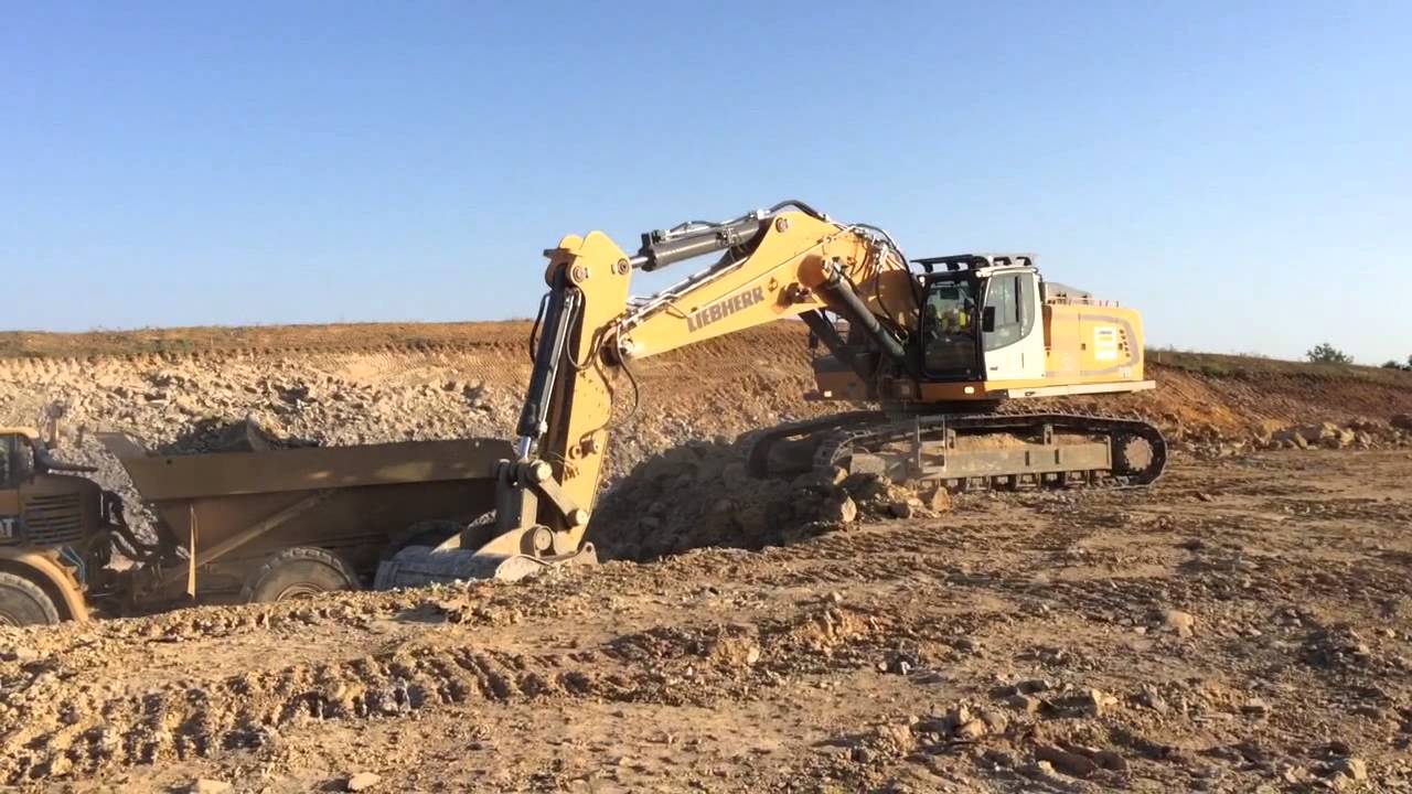 Liebherr R966 and 740 - YouTube
