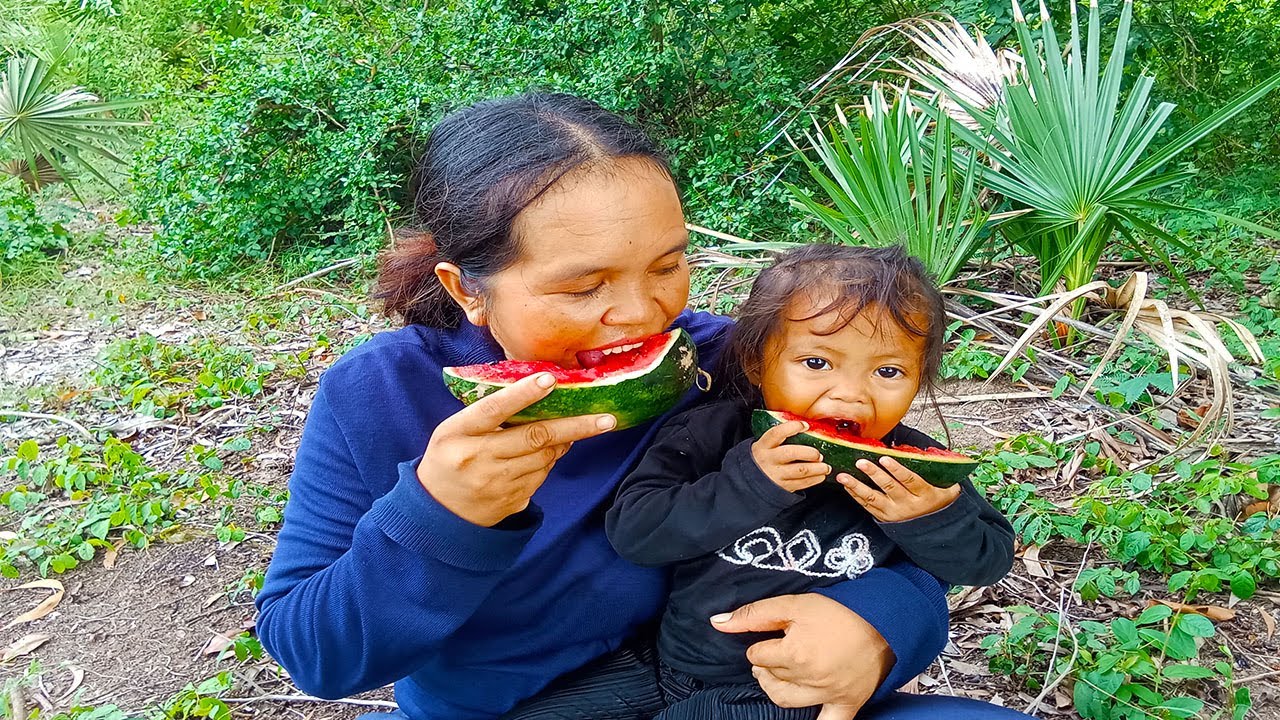 Eat Something Delicious - Mother And Child Eat Delicious Wild Fruits ...