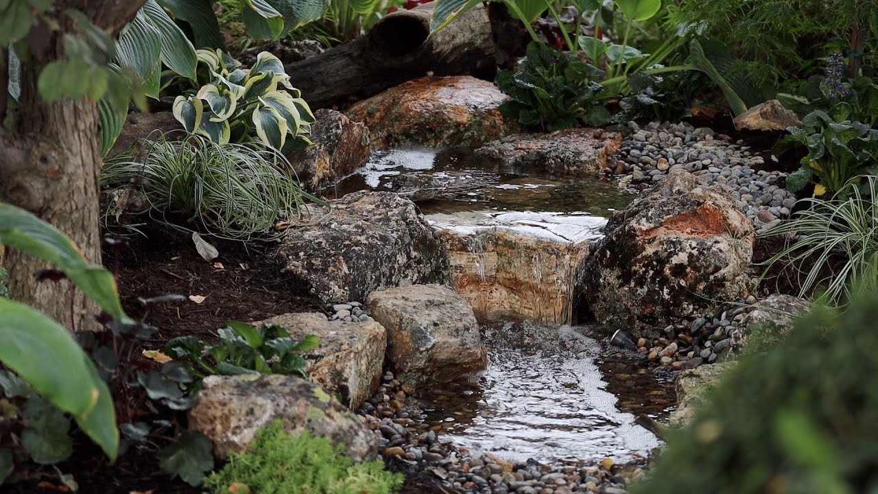 Installing an Amazing Water Feature in the Garden 💦🙌😍 - YouTube