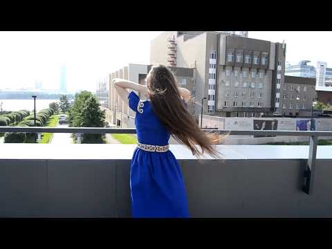 LONGHAIRED GIRL. Playing long hair in the wind