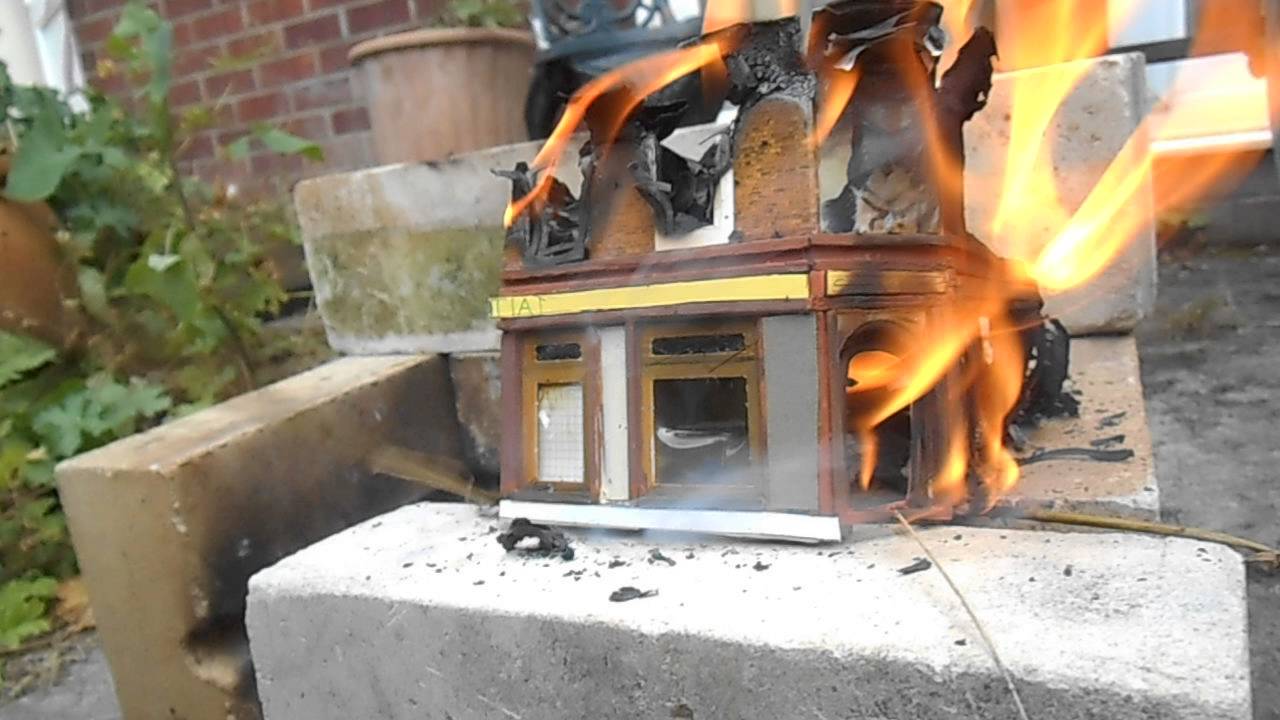 Burning down model building - YouTube