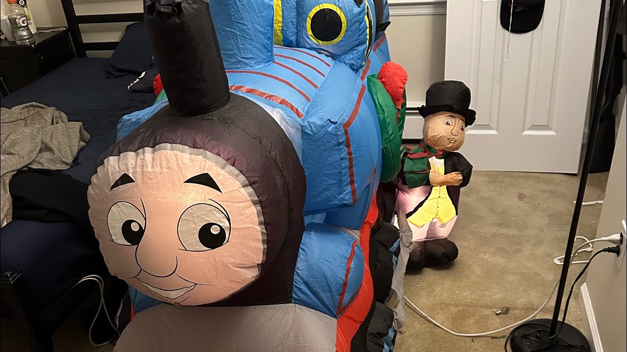 Christmas inflatable Tomas the Train with the fat conductor - YouTube