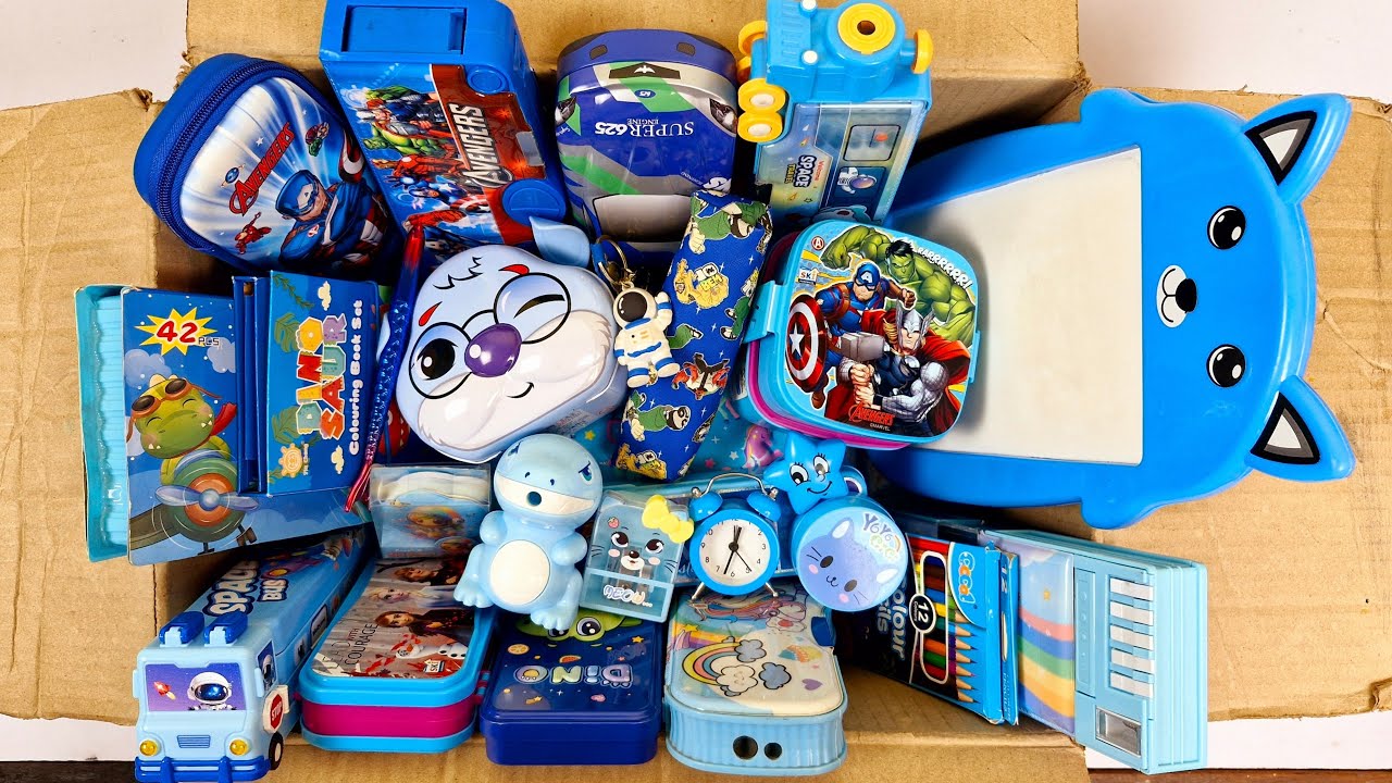 Box full of blue stationery - whote board, lunch box, Keychain, alarm ...