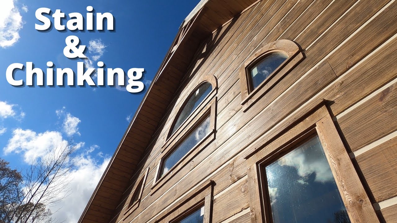Staining & Chinking | Log Home Build - YouTube
