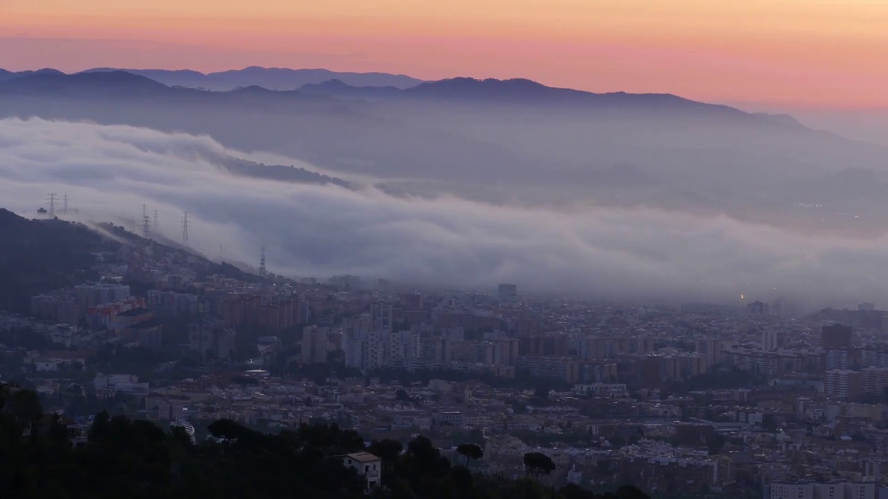 Timelapse Captures 'Fog Waterfall' Gliding Over Barcelona - YouTube