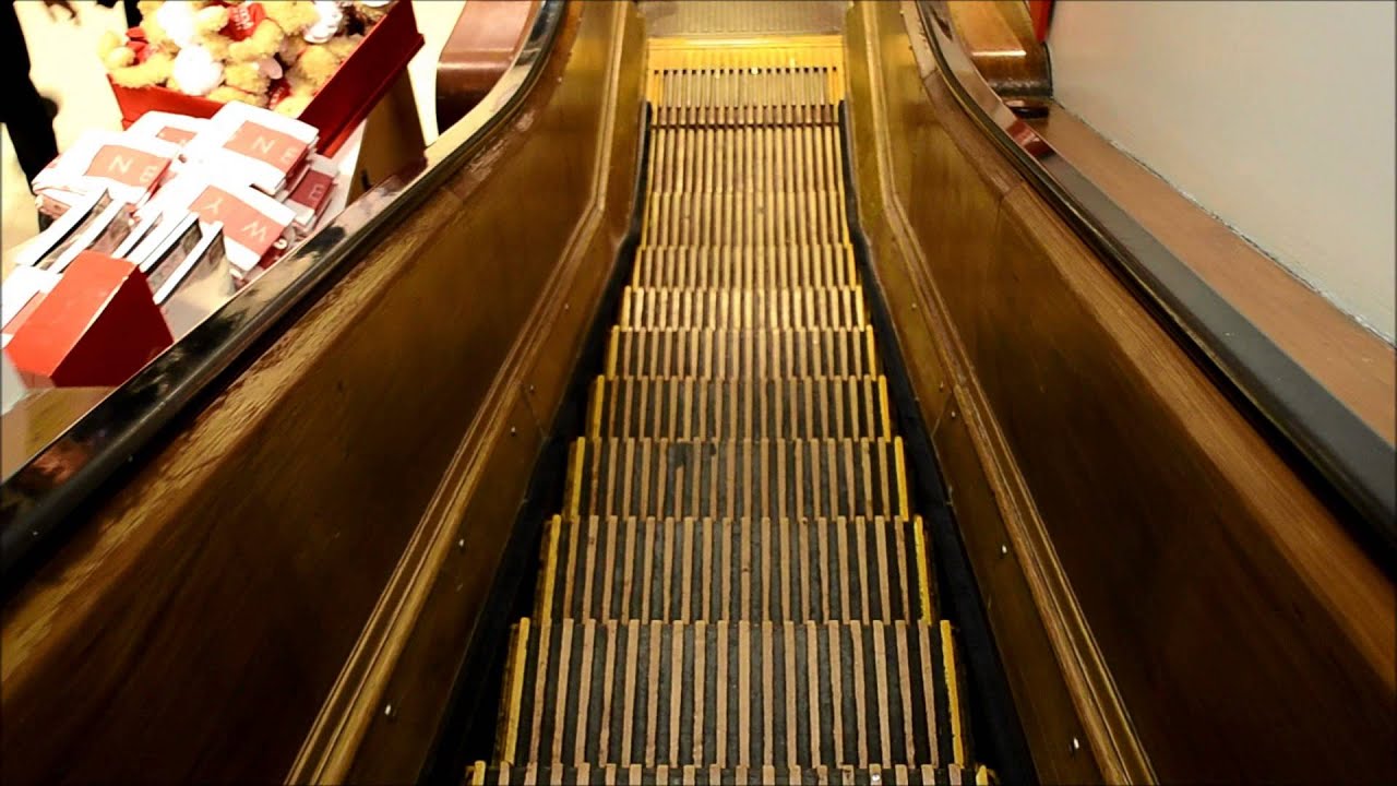 Wood Escalators at Worlds largest store Macy's - YouTube