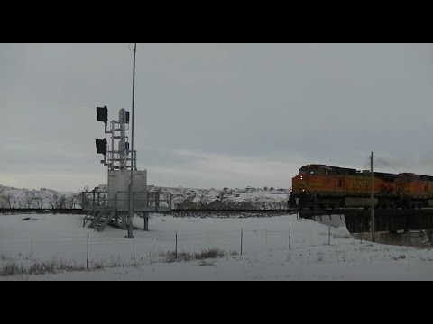BNSF X train blowing over Glendive Creek as it begins the assault of ...