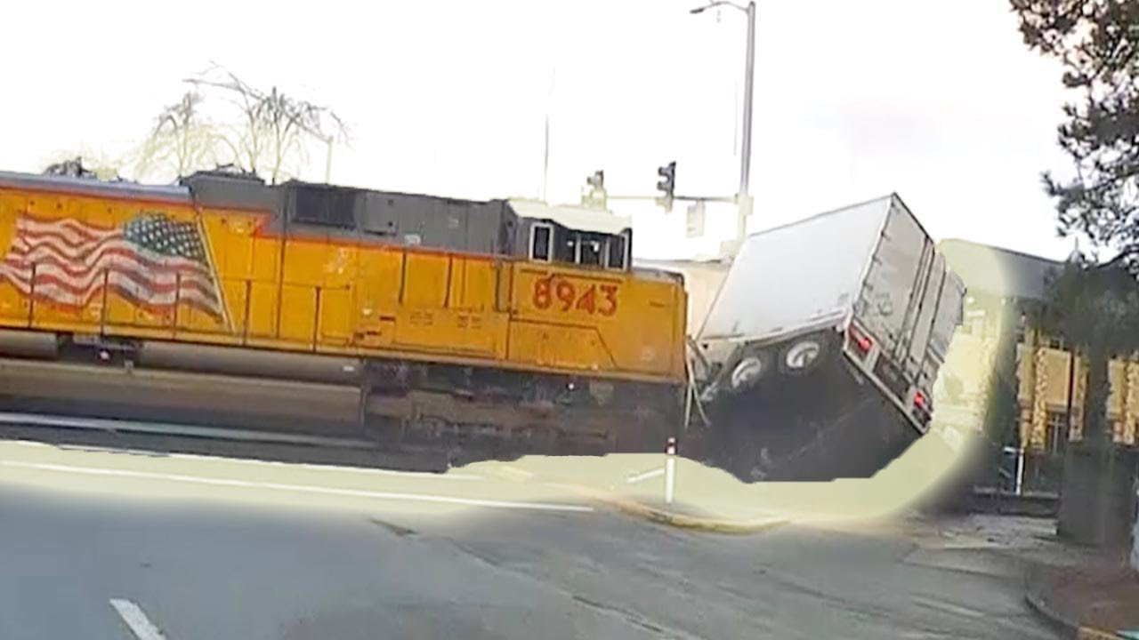 Train Collides With Truck's Trailer - YouTube