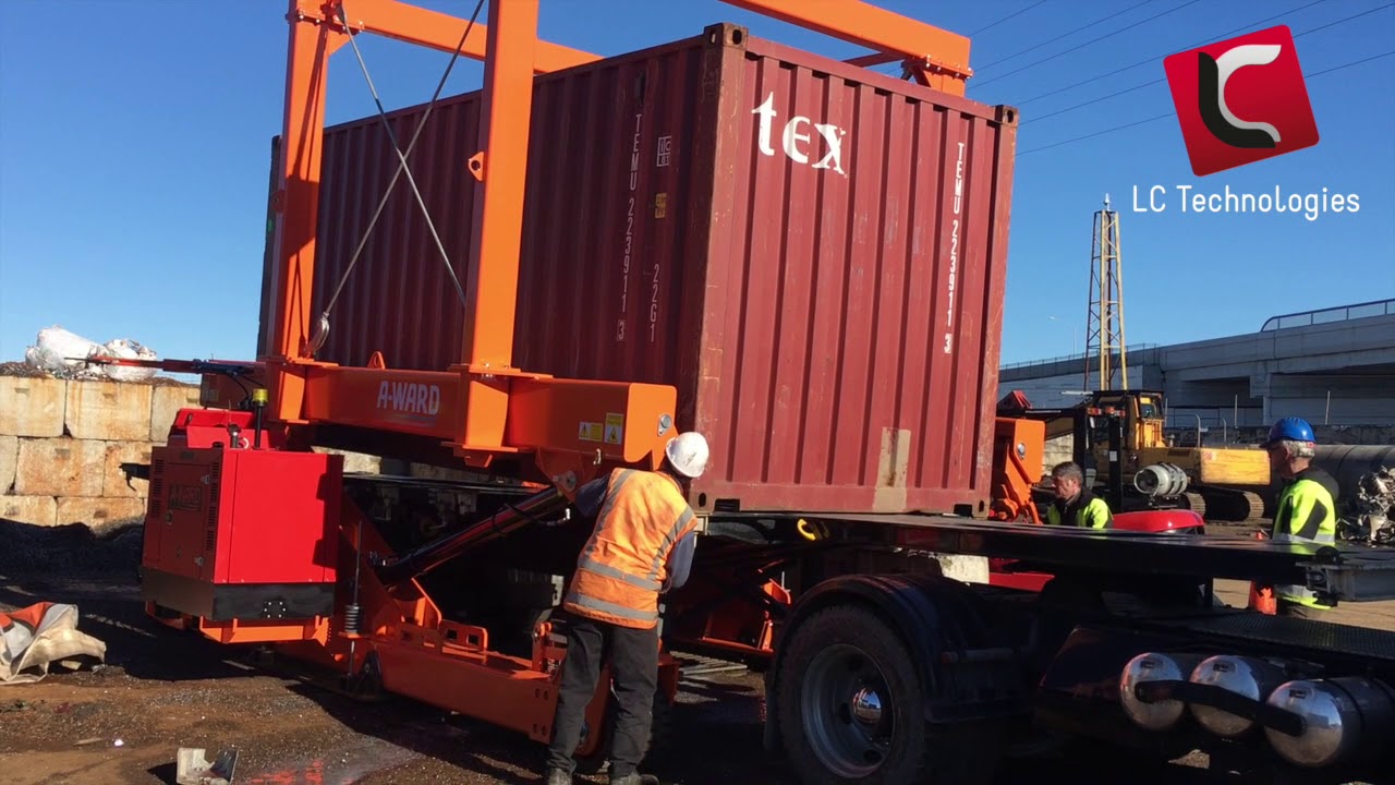 Basculeur mobile A-Ward de déchargement de conteneurs maritimes - YouTube