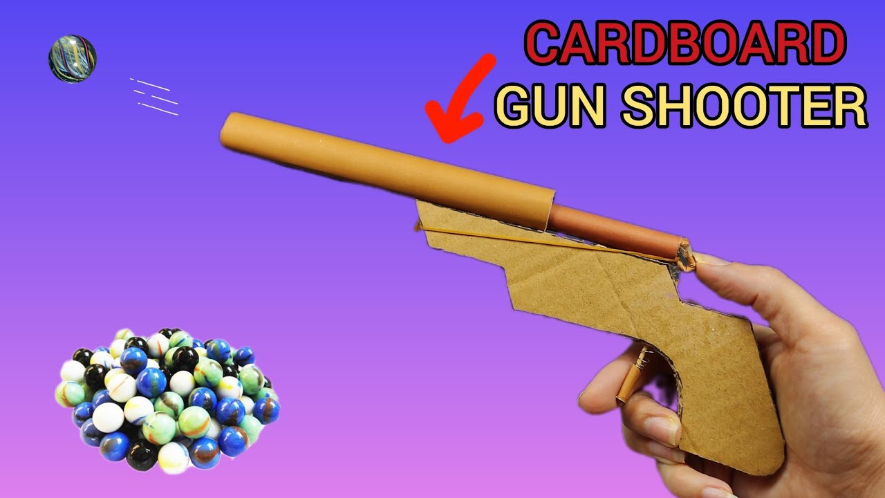 How to make cardboard gun powered by rubberband | Marble shooting gun ...
