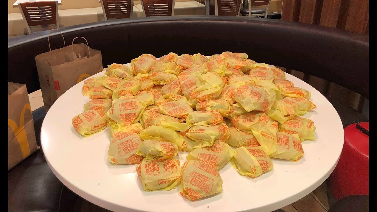 BUYING 100 CHEESEBURGERS FROM MCDONALDS!! FEEDING HOMELESS!! - YouTube