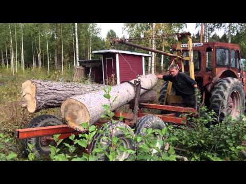 loading logs on Volvo BM boxer with cable crane