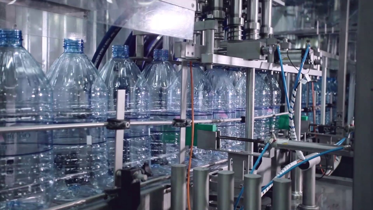 Complete filling line for the PET bottle packaging format 10L - YouTube