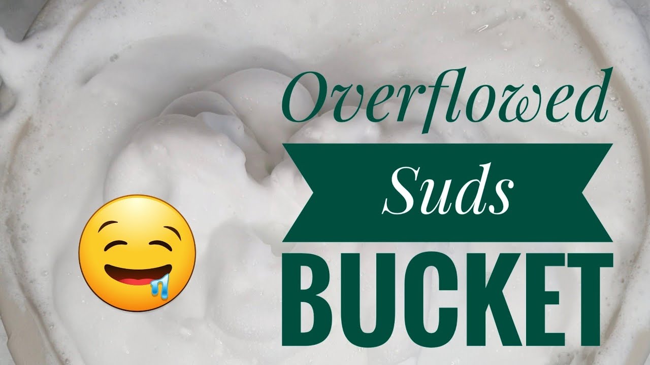 Overflowed Suds Bucket / Pressing and Squeezing Black thin Sponges ...