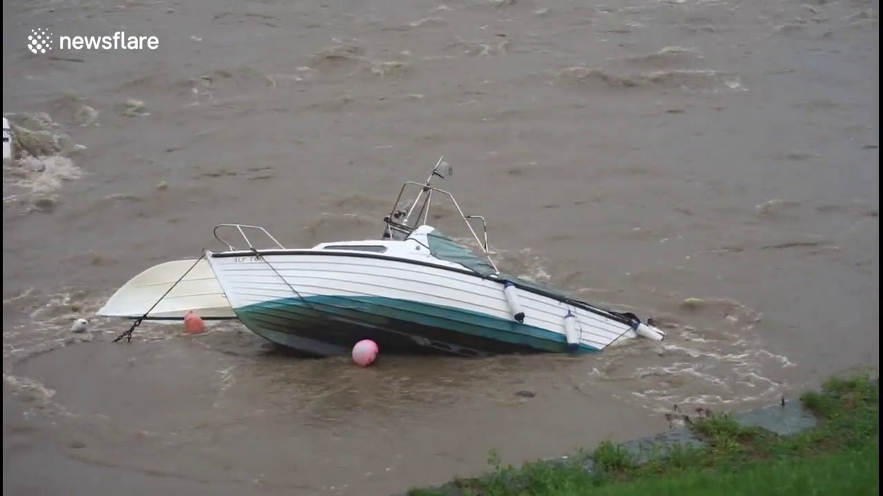 After Storm Callum: Capsized boats in Welsh harbour - YouTube