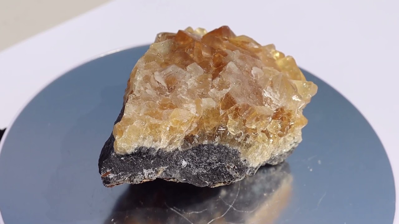 Yellow Rhombic Calcite - YouTube