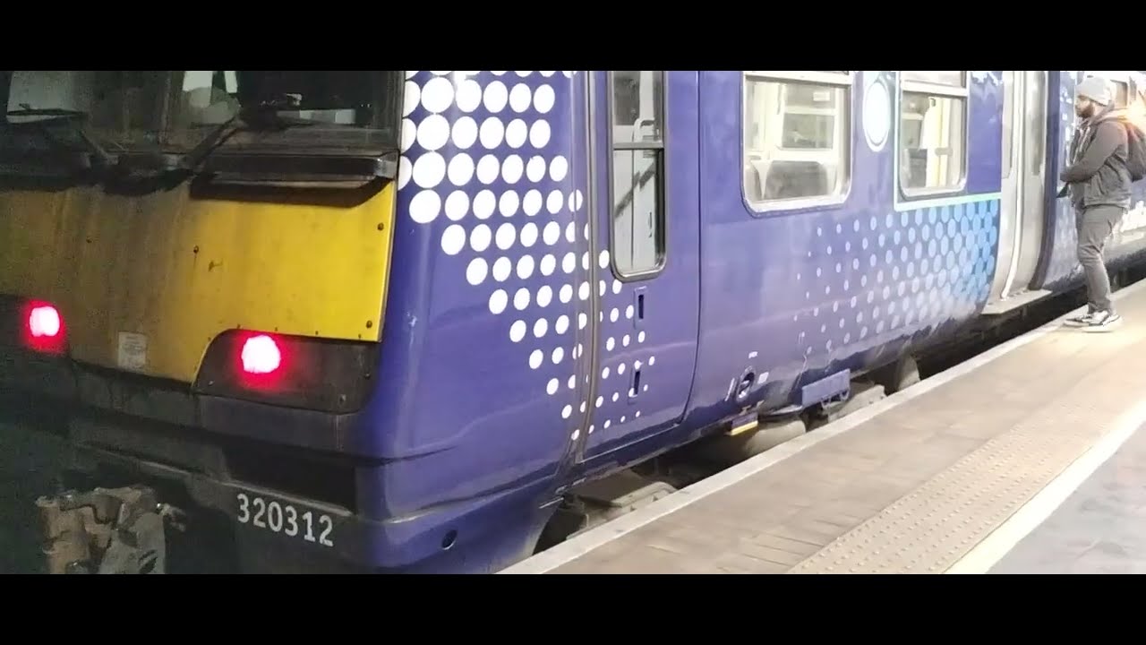 British Rail Class 318/320 #318263/#320312 arriving at Glasgow Central ...