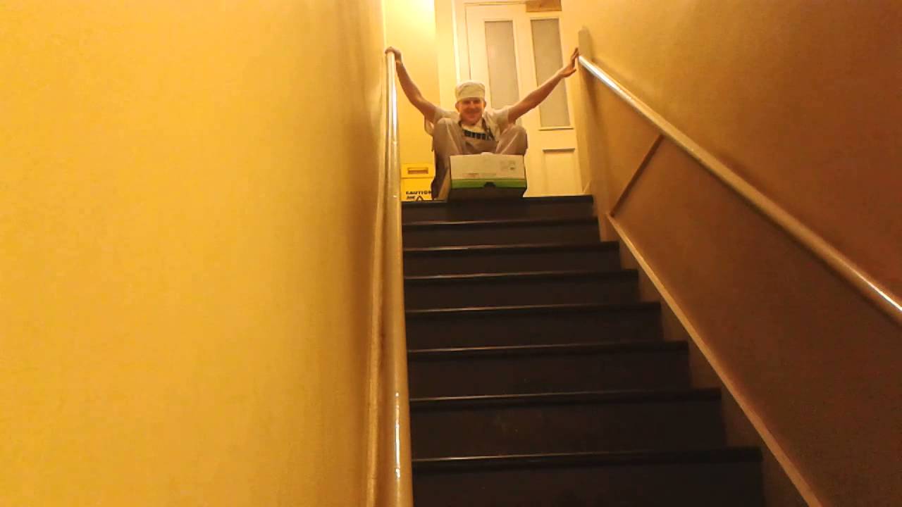 Ginger chef flying down the stairs in a box - YouTube