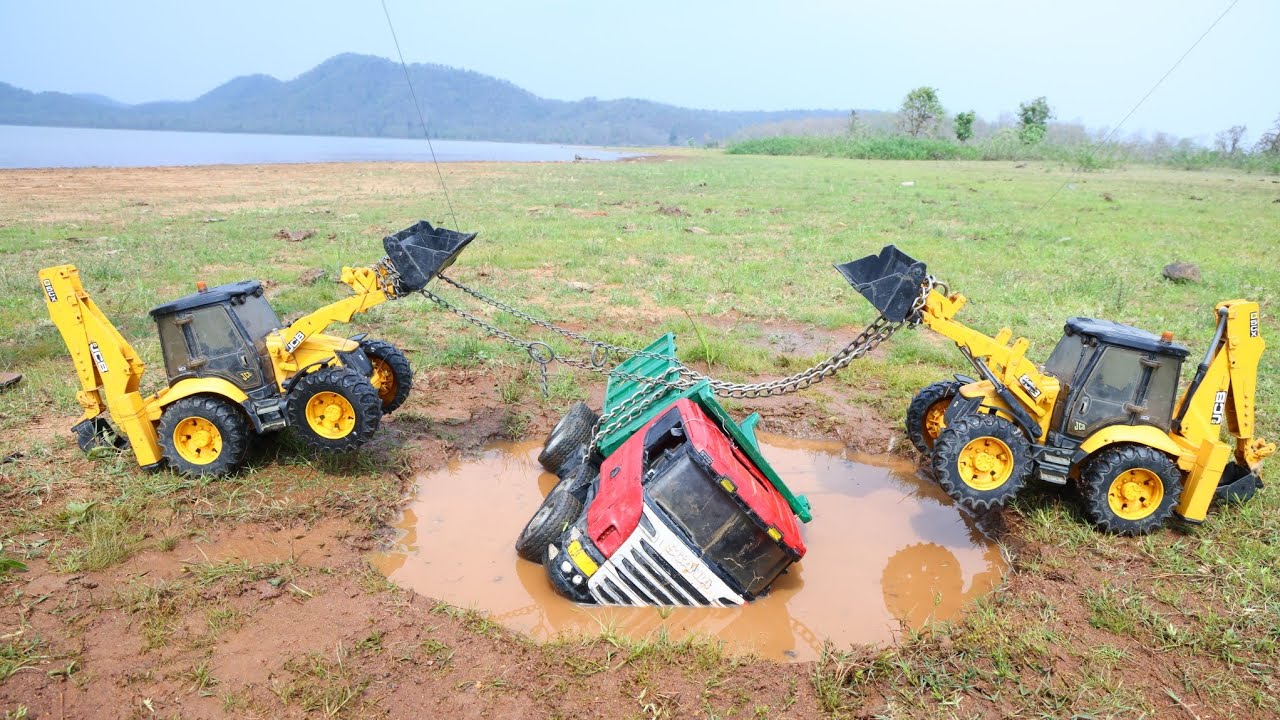 Ashok Leyland And Scania Truck Accident Pulling Out JCB Backhoe JCB 3DX ...