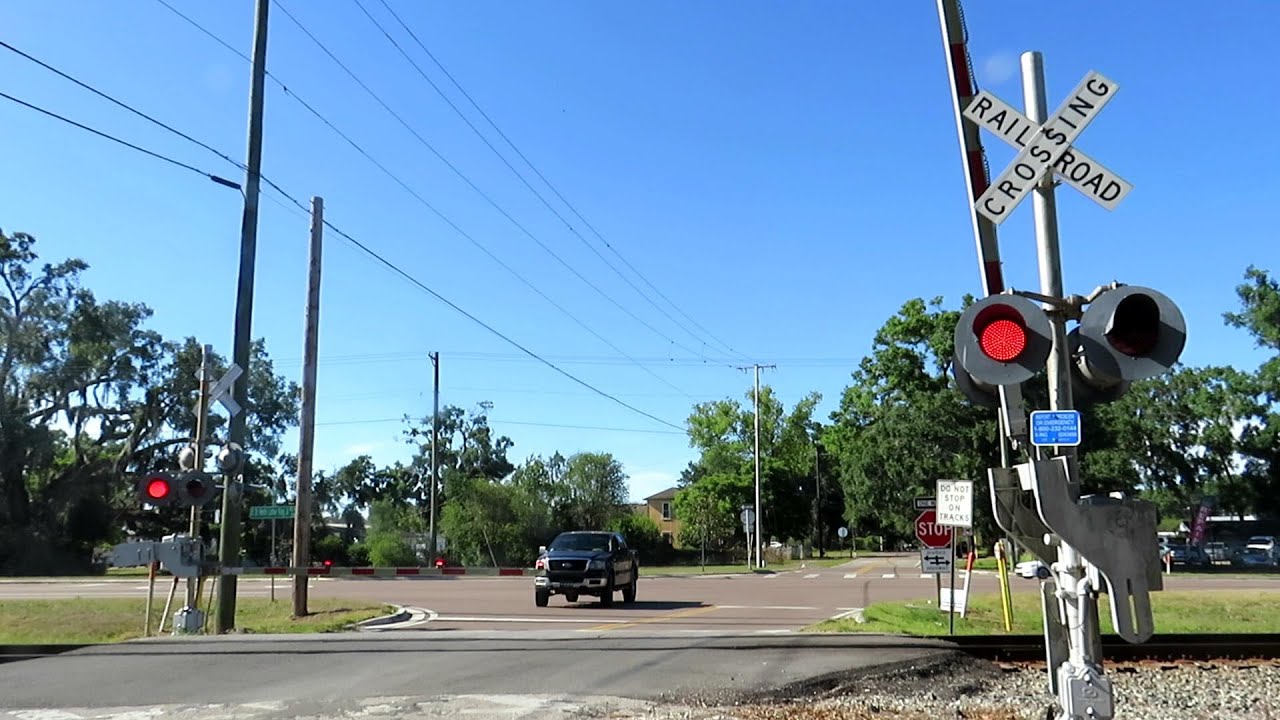 Railroad Crossing Gate Malfunctions After Train Passes - YouTube