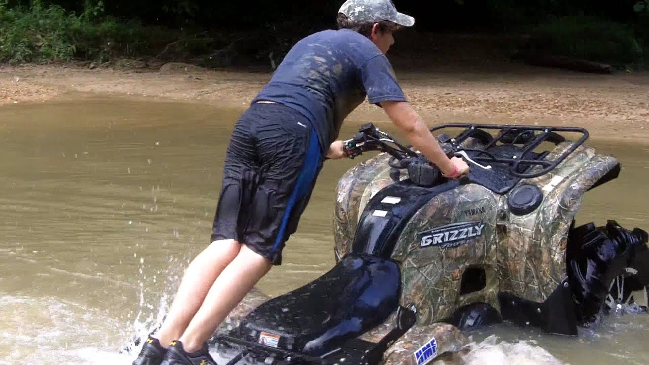 water wheelie with grizzly 700 - YouTube