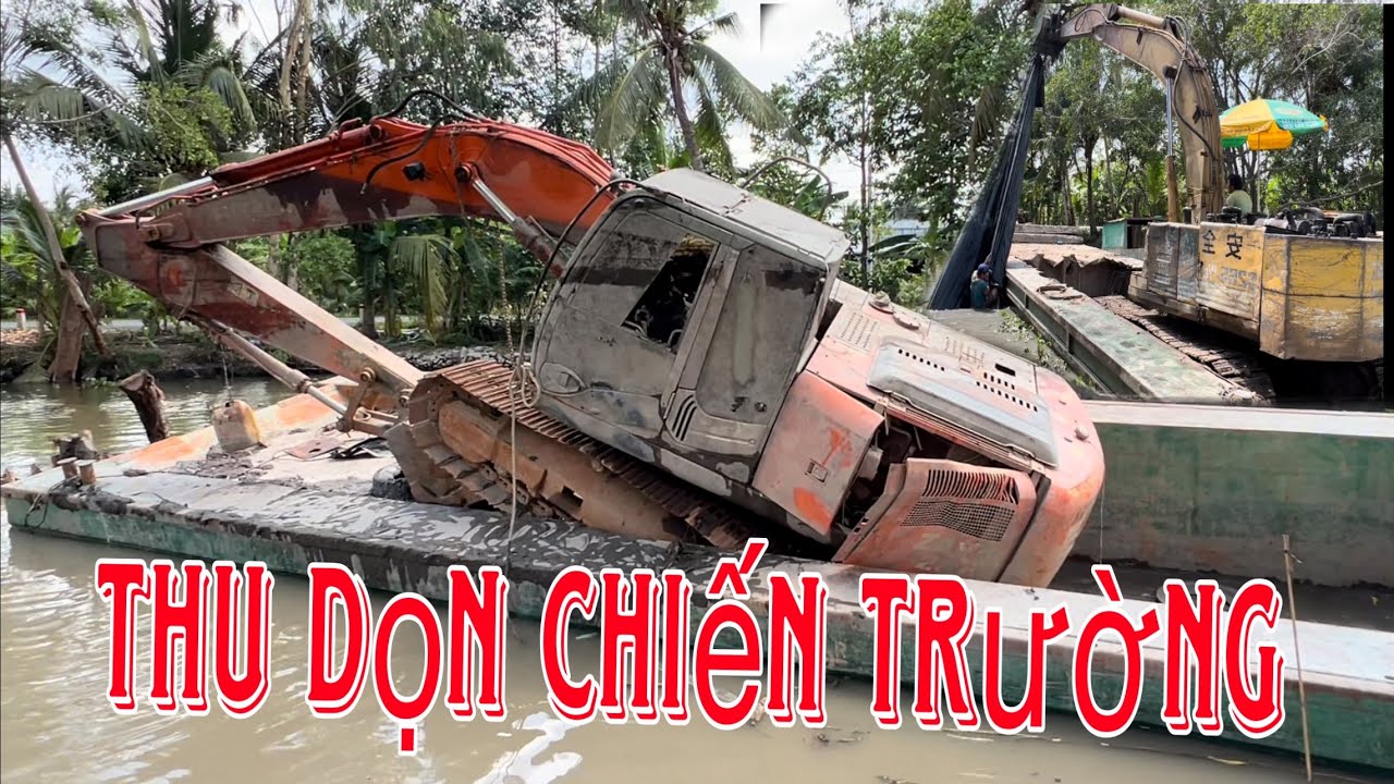 Xe cuốc 05 thu Dọn chiến trường đập giải cứu xe cuốc 07 chìm - YouTube