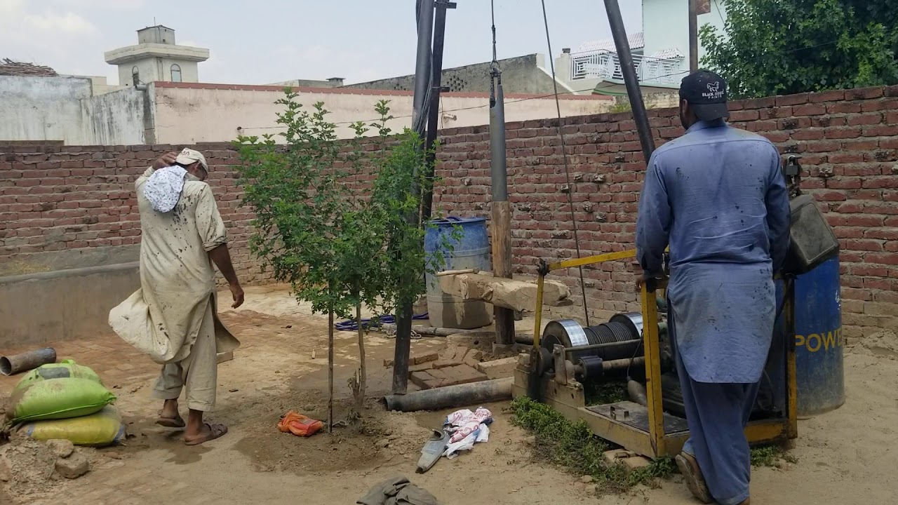 Hand borewell drilling inside a house - YouTube