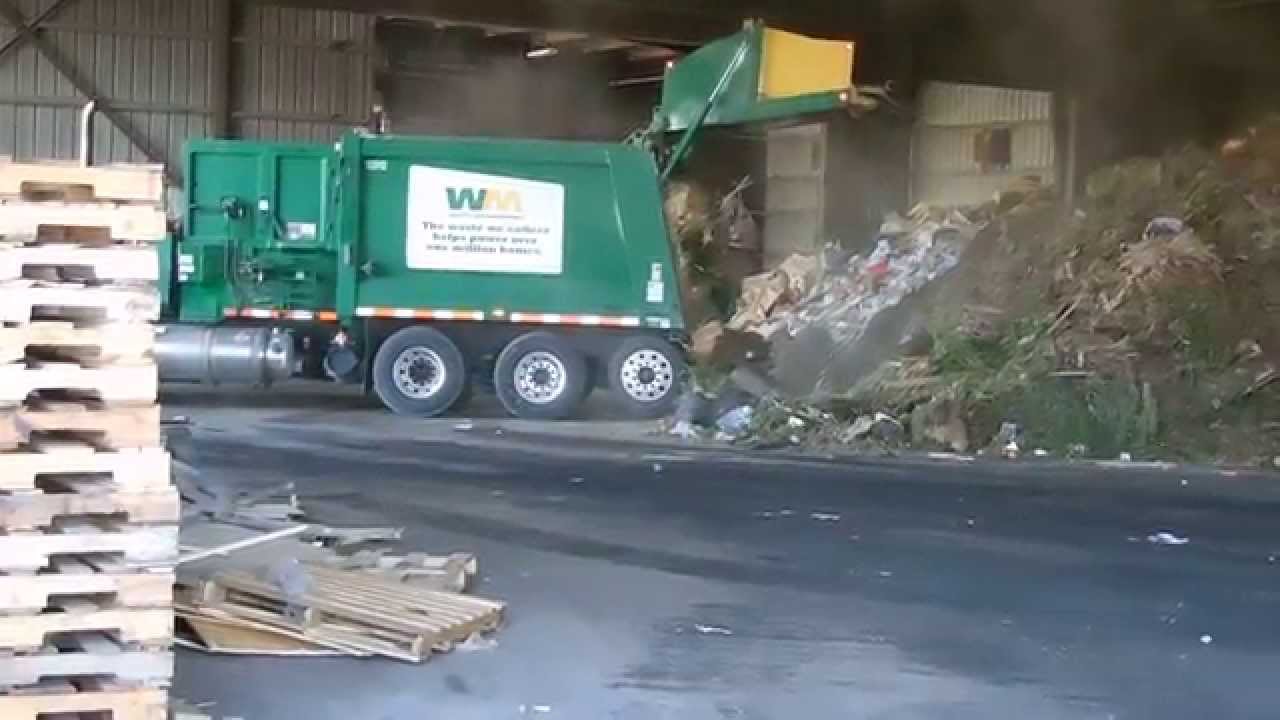 Waste Management Python Unloading - YouTube