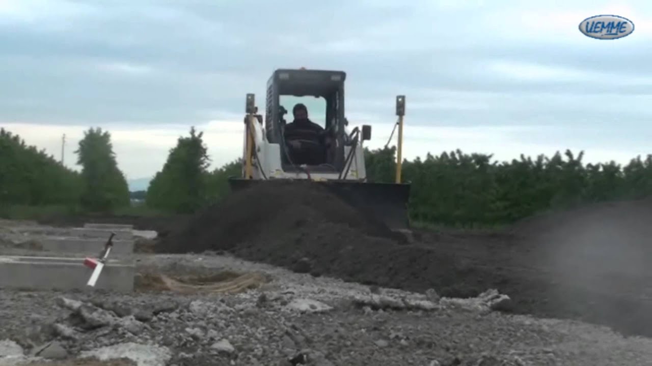 UEMME LASER TILT DOZER BLADE - YouTube