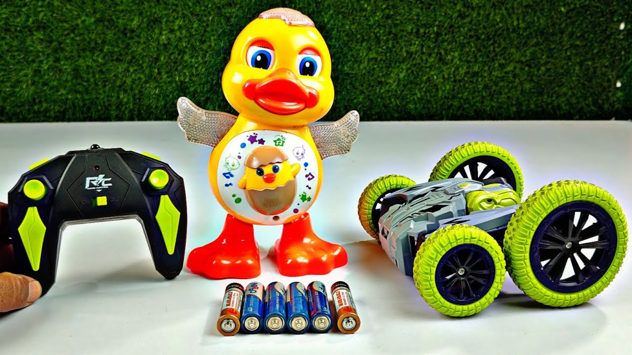 Unboxing RC Dainasur Remote Control 360° Stunt, Electric Dancing Duck ...