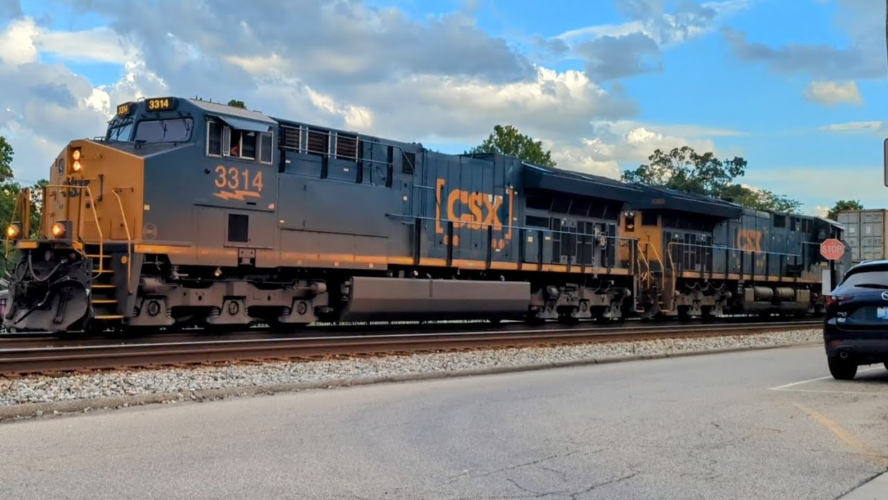 Northbound CSX I142 intermodal on track two, crossing Sharon Ave, heading to North Baltimore, OH ...