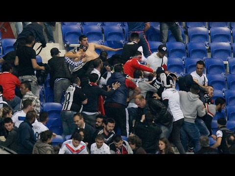 Lyon v Besiktas Europa League tie marred by violence – video report