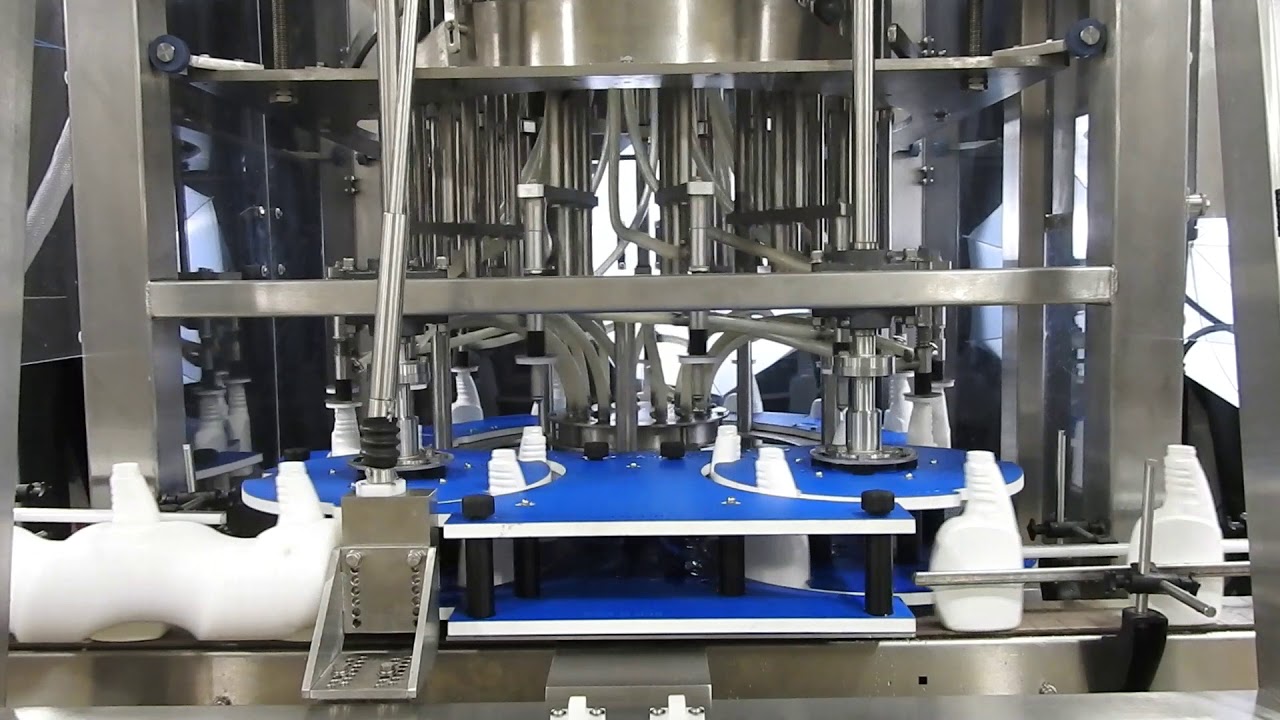 Rotary Pressure Overflow Filler - YouTube