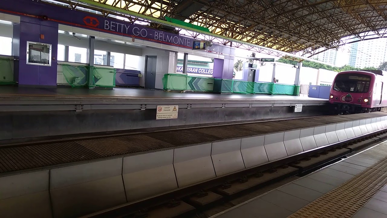 LRT Line train set number 17 arriving at Betty Go Belmonte Station ...