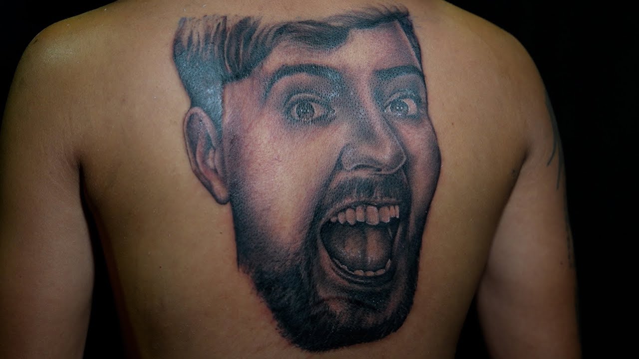 I Tattooed @MrBeast in my back - YouTube