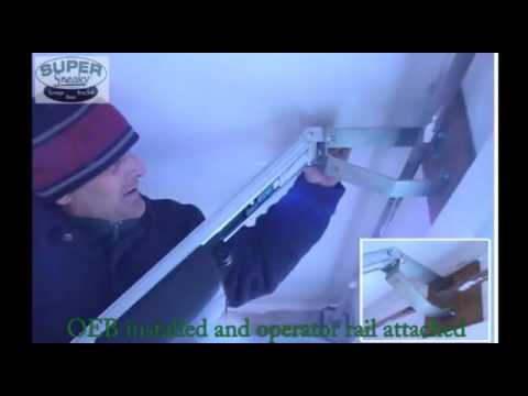 Operator installed in manual double track system - YouTube