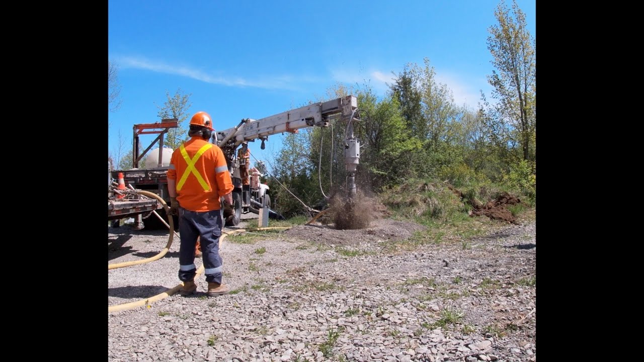 Drilling Bedrock and Installing a Utility (Hydro) Pole - YouTube