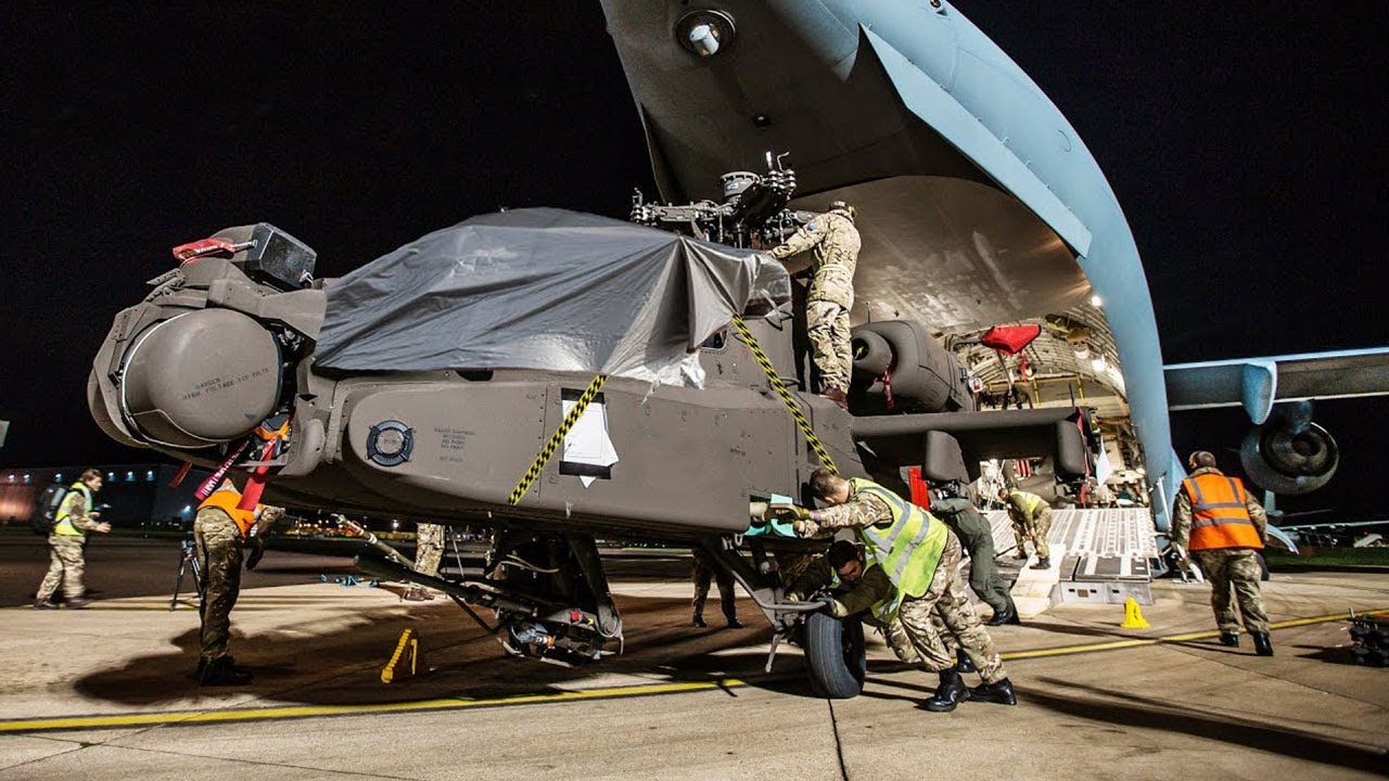 Venezuela on High Alert! US C-17 Delivers Dozens of AH-64 Apache to the ...