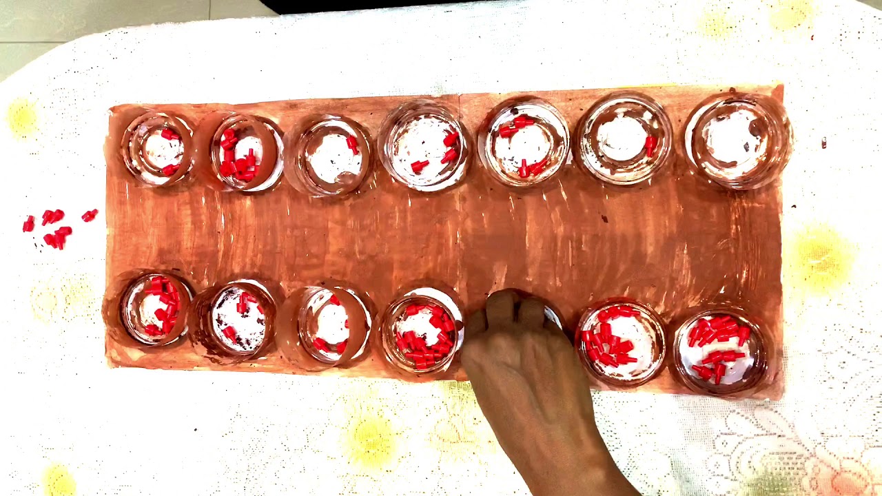 How to play ancient Indian game Vamana Guntalu | Pallankuzhi | Indoor ...