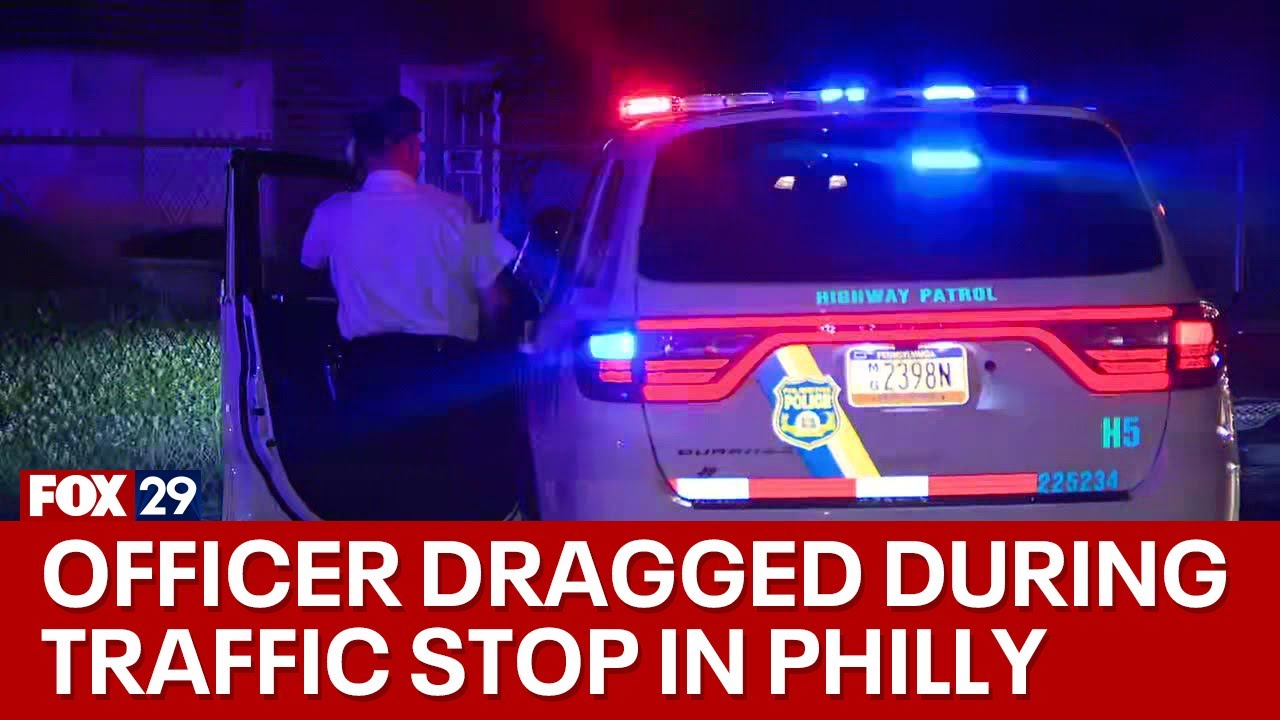 Driver sought after dragging officer 200 feet during traffic stop in ...
