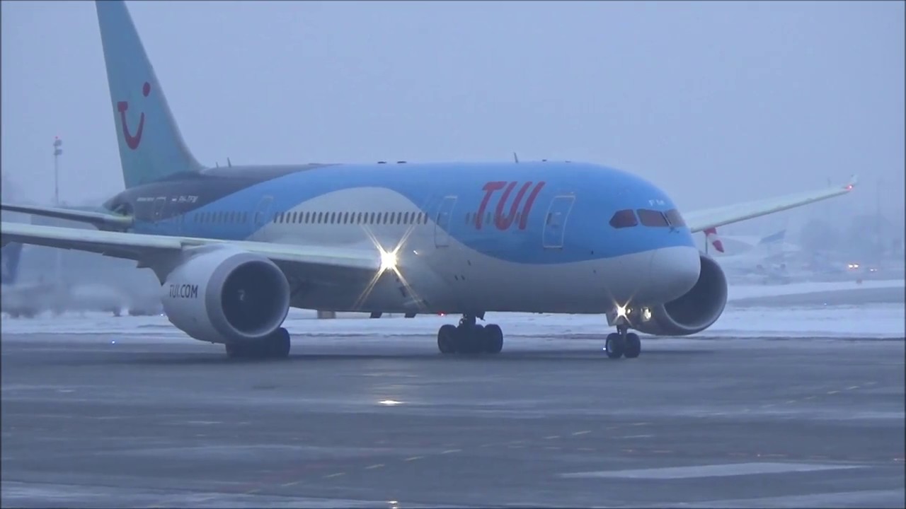 Orange in winter scenery -TUI Airlines NL's Boeing 787 takeoff from ...